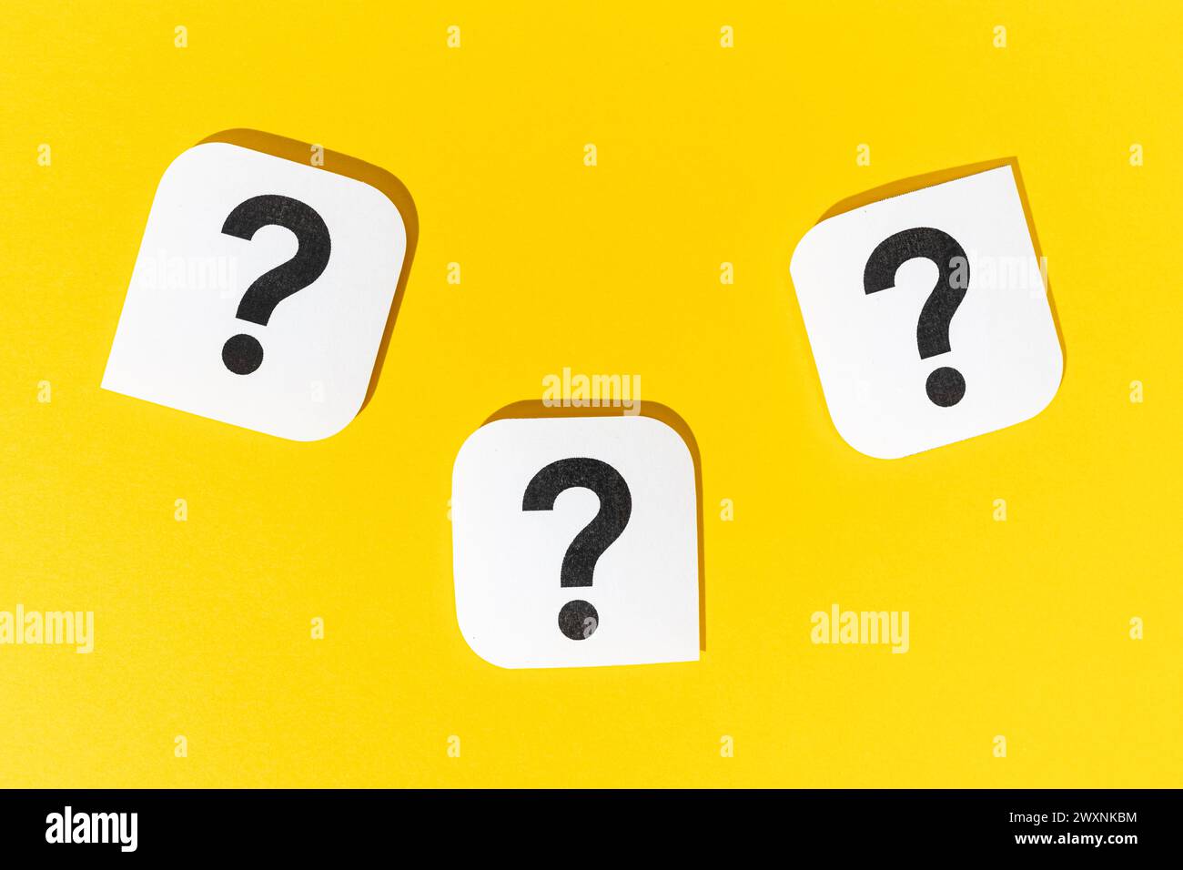 Group of Question marks signs on yellow background Stock Photo - Alamy