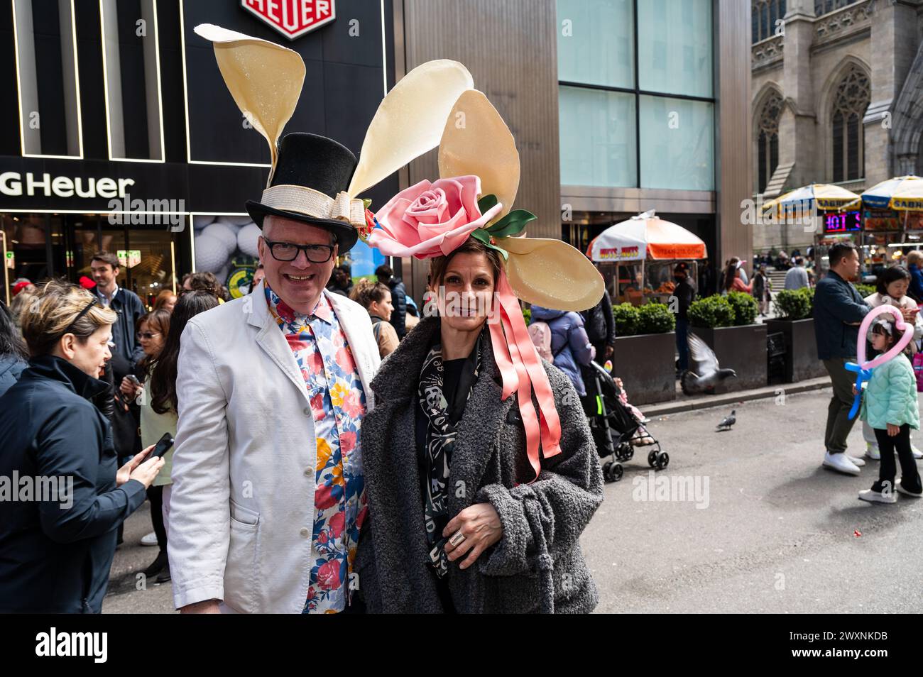 New York, New York, USA, 31 March 2024. Revelers stroll and pose along ...
