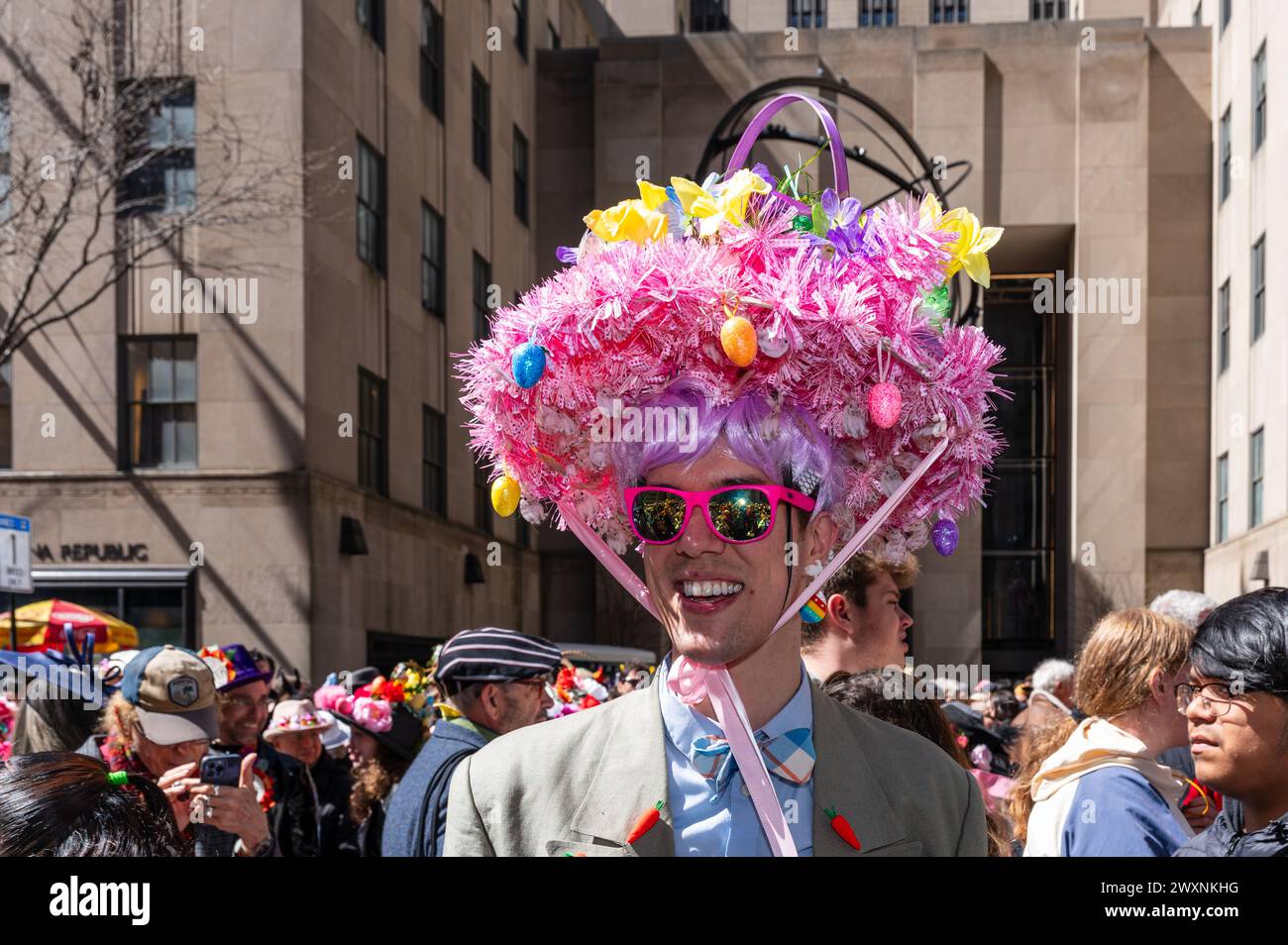 New York, New York, USA, 31 March 2024. Revelers stroll and pose along ...