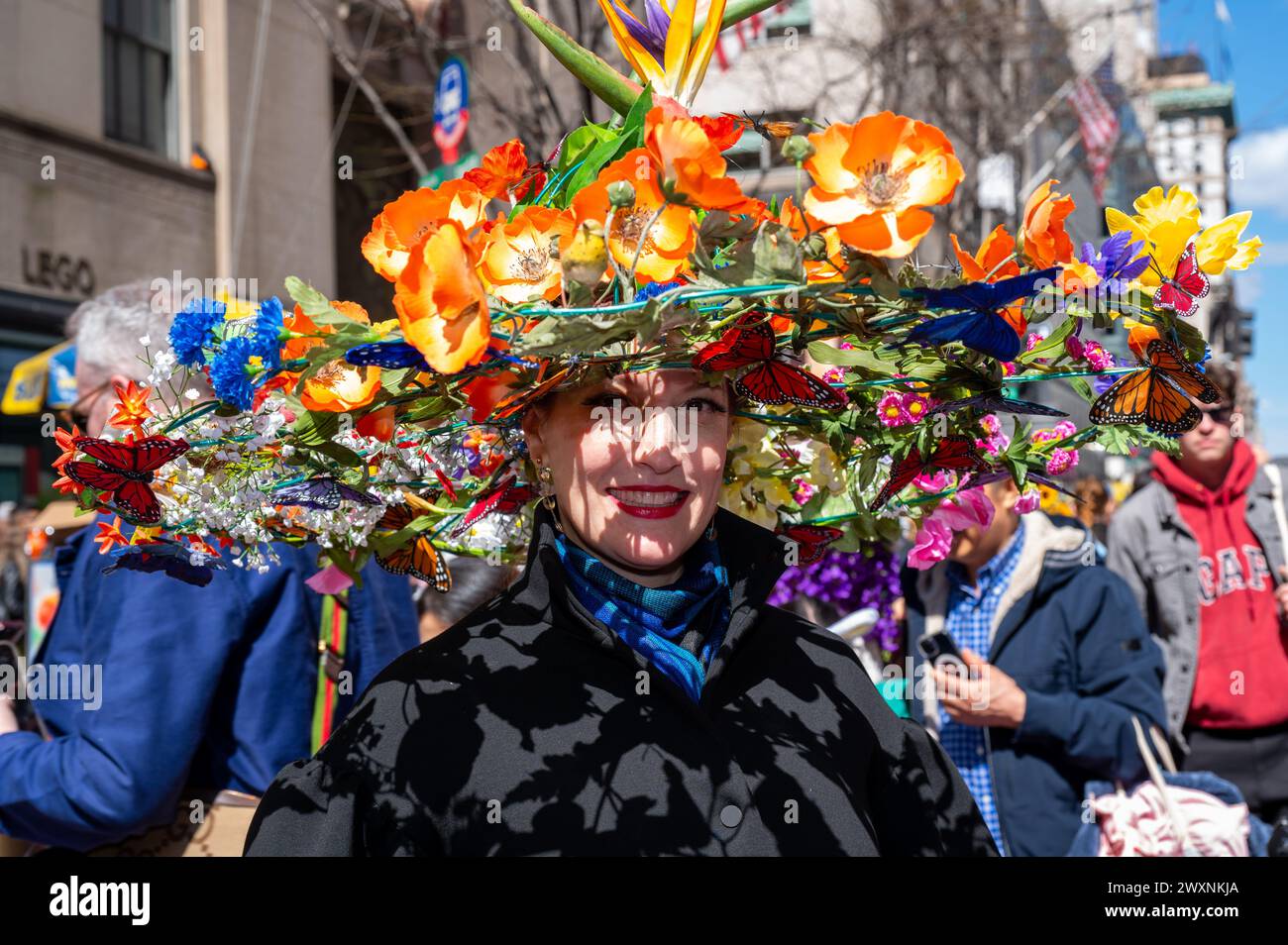 New York, New York, USA, 31 March 2024. Revelers stroll and pose along ...