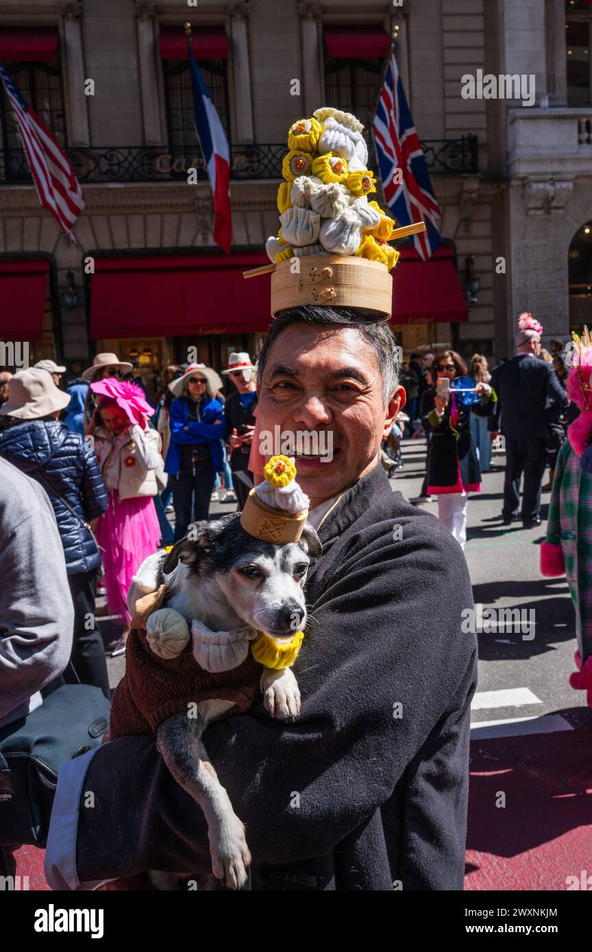 New York, New York, USA, 31 March 2024. Revelers stroll and pose along ...
