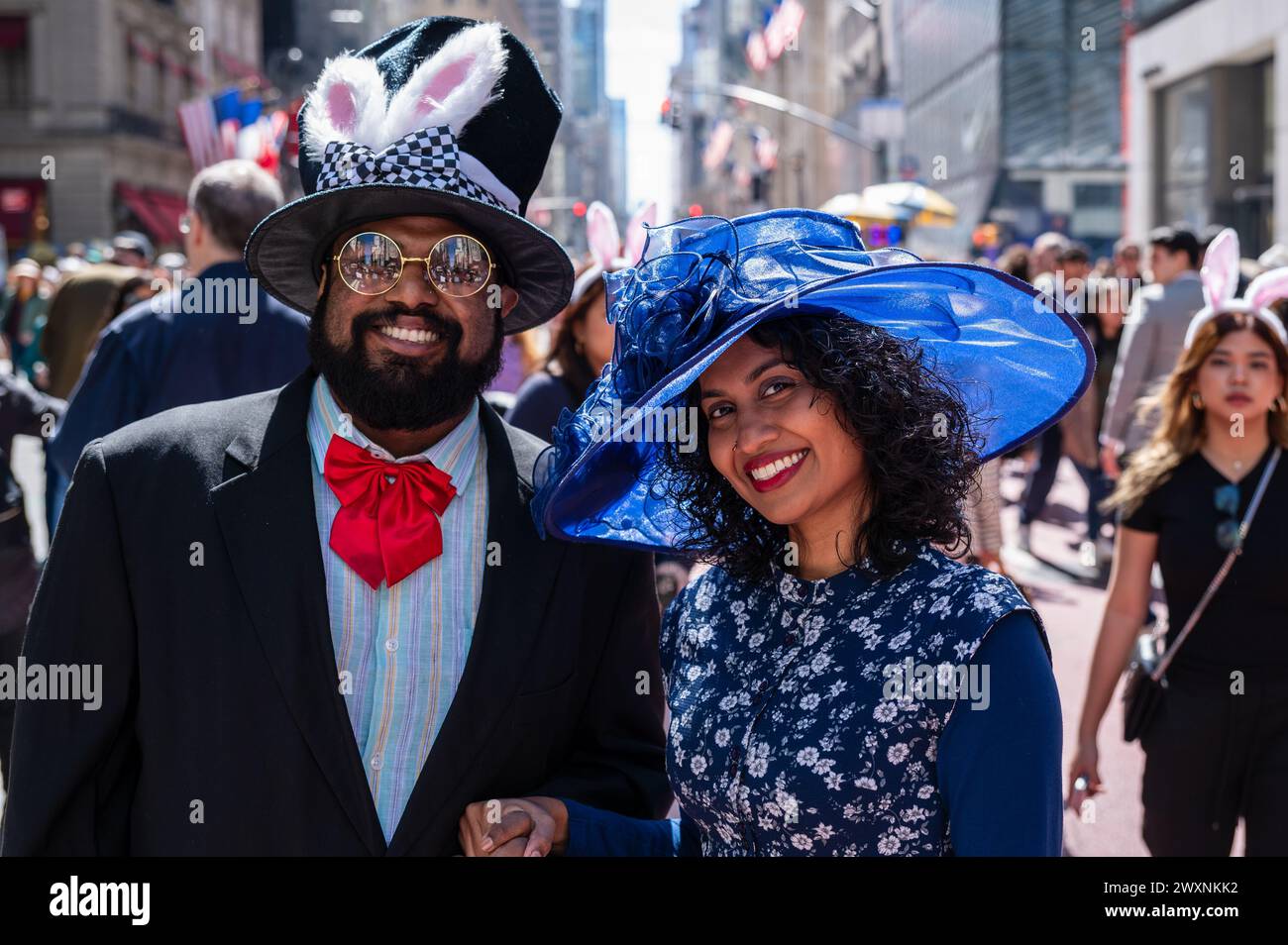 New York, New York, USA, 31 March 2024. Revelers stroll and pose along ...
