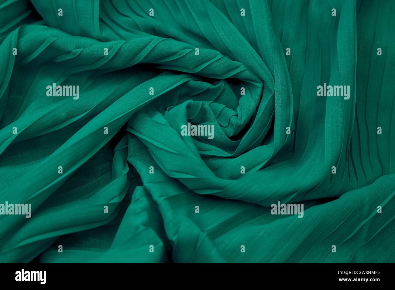 The luxurious emerald green fabric for a bed backdrop Stock Photo - Alamy