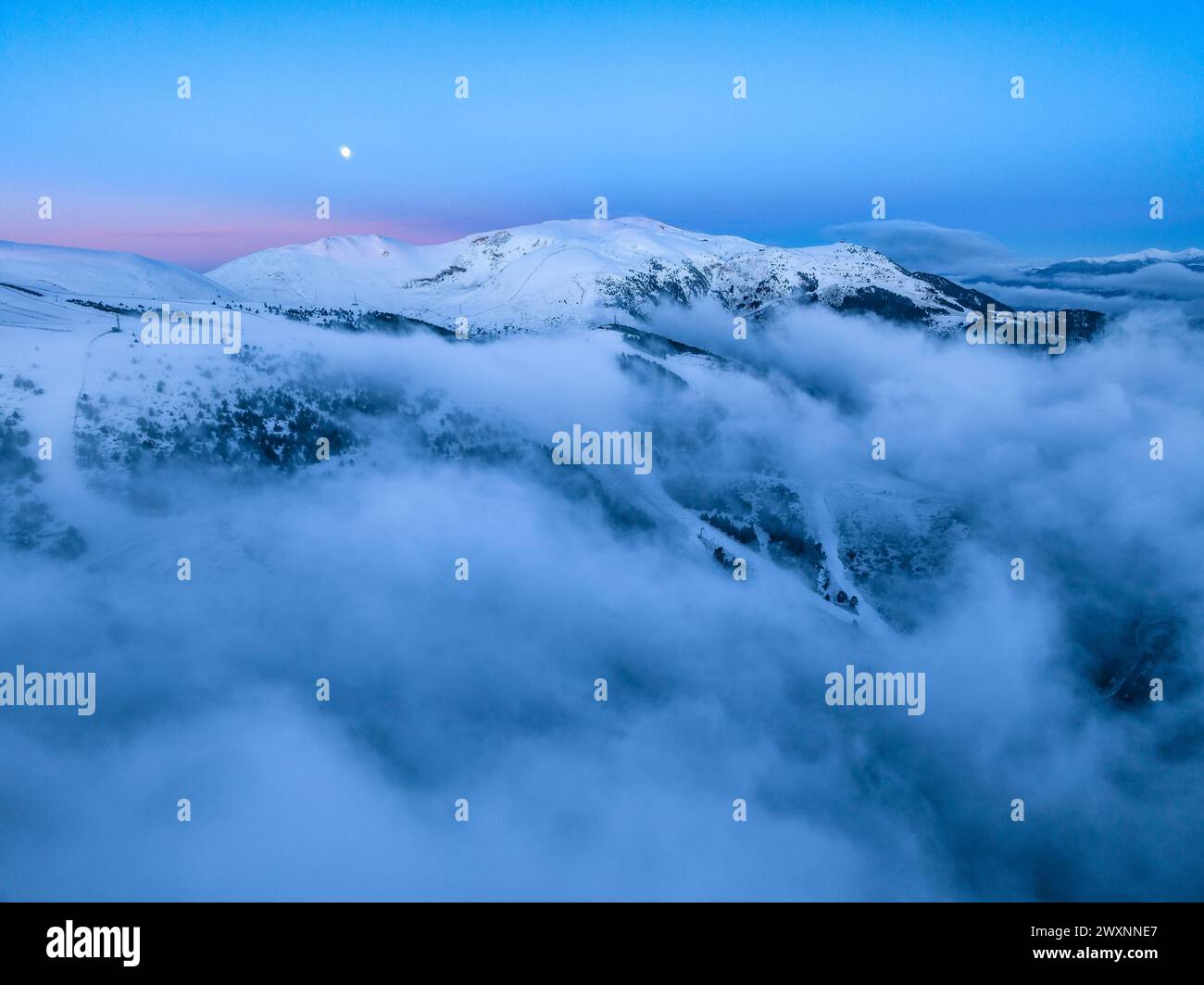 Aerial view of the snow-capped Tosa d'Alp mountain at sunrise with the ...
