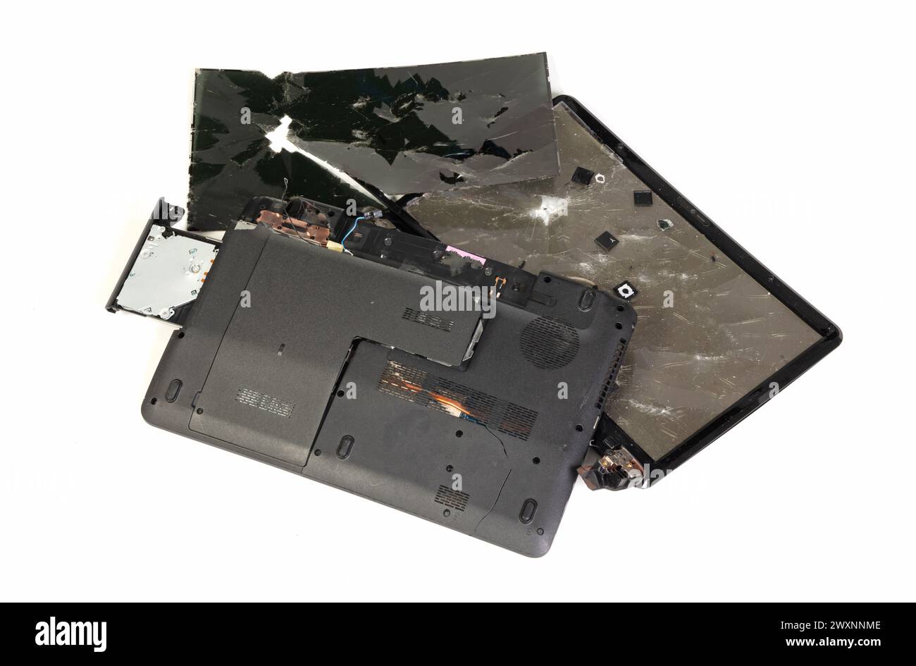 Old broken laptop isolated on white a background Stock Photo - Alamy
