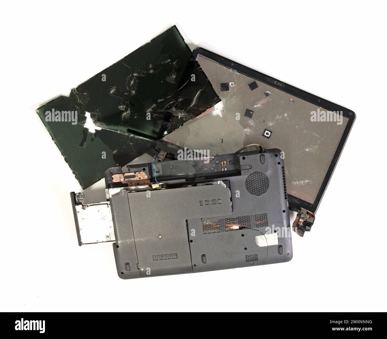 Old broken laptop isolated on white a background Stock Photo - Alamy