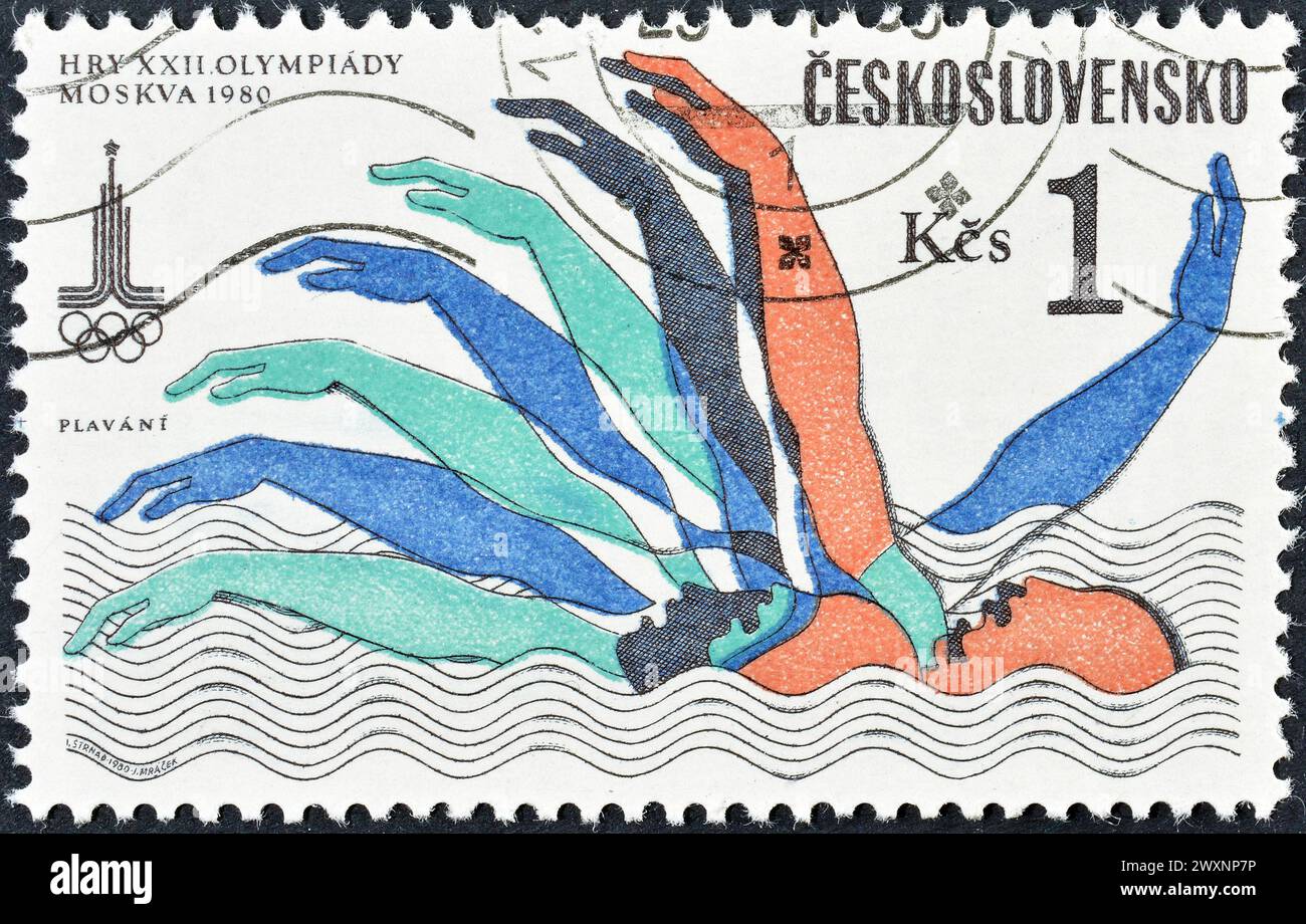 Cancelled postage stamp printed by Czechoslovakia, that shows Swimming ...