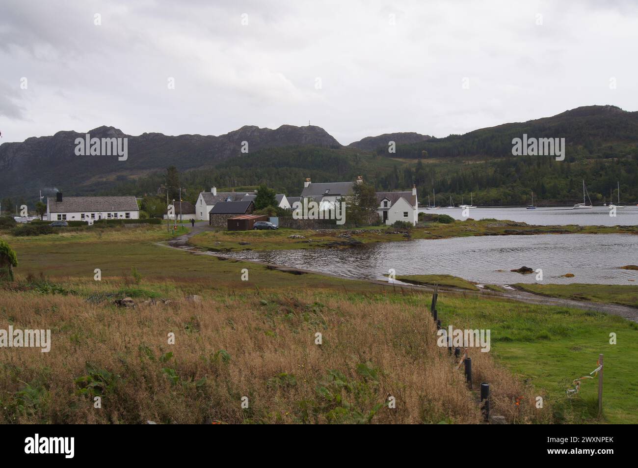 The village of Plockton on the shores of Loch Carron, Lochalsh, Wester ...