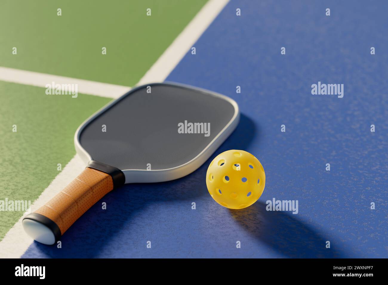 The pickleball racket and ball lie on the line of the court floor ...