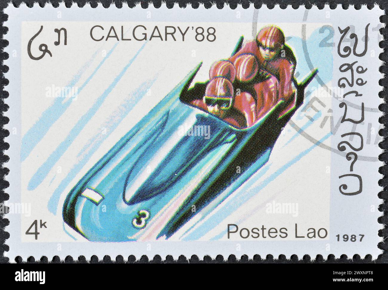 Cancelled postage stamp printed by Laos, that promotes Winter Olympic ...