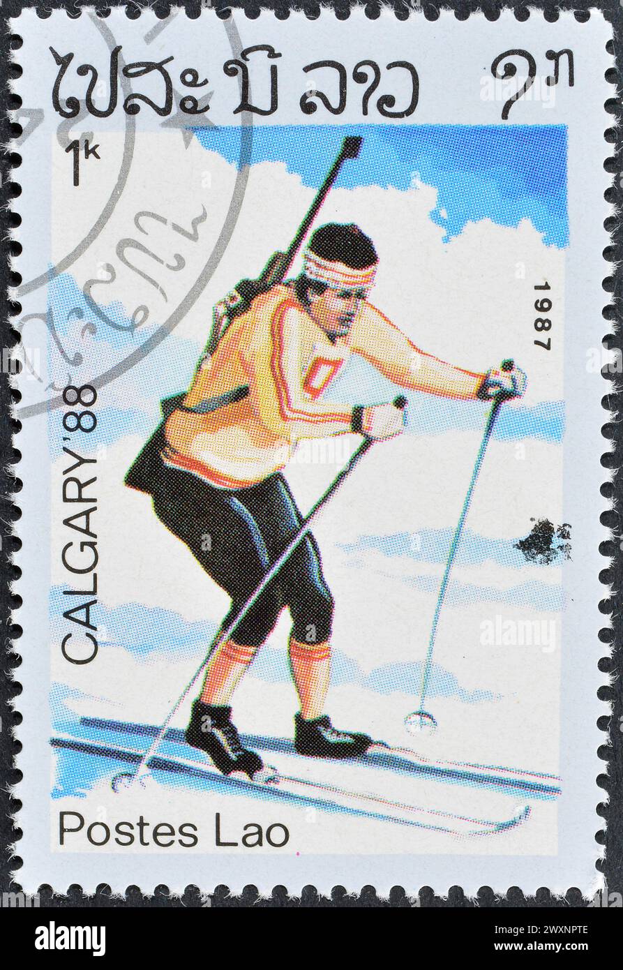 Cancelled postage stamp printed by Laos, that promotes Winter Olympic ...