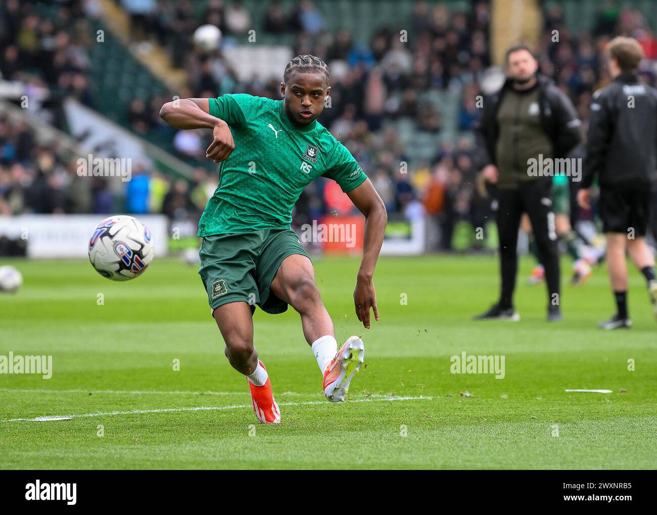 Bali Mumba of Plymouth Argyle warming up during the Sky Bet ...