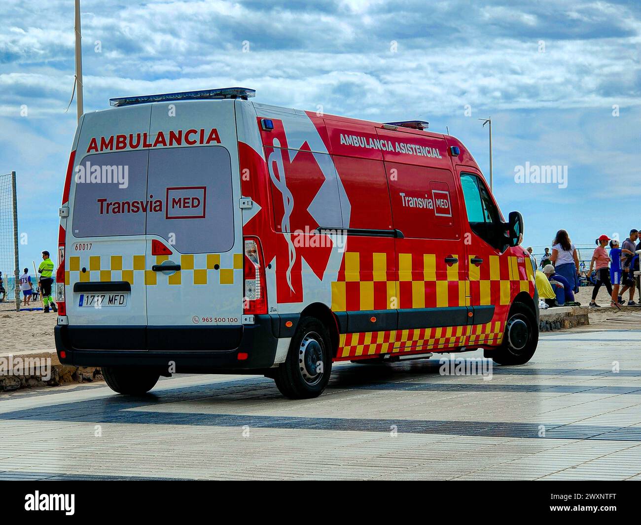 An ambulance parked in front of the beach ready to cover an emergency ...