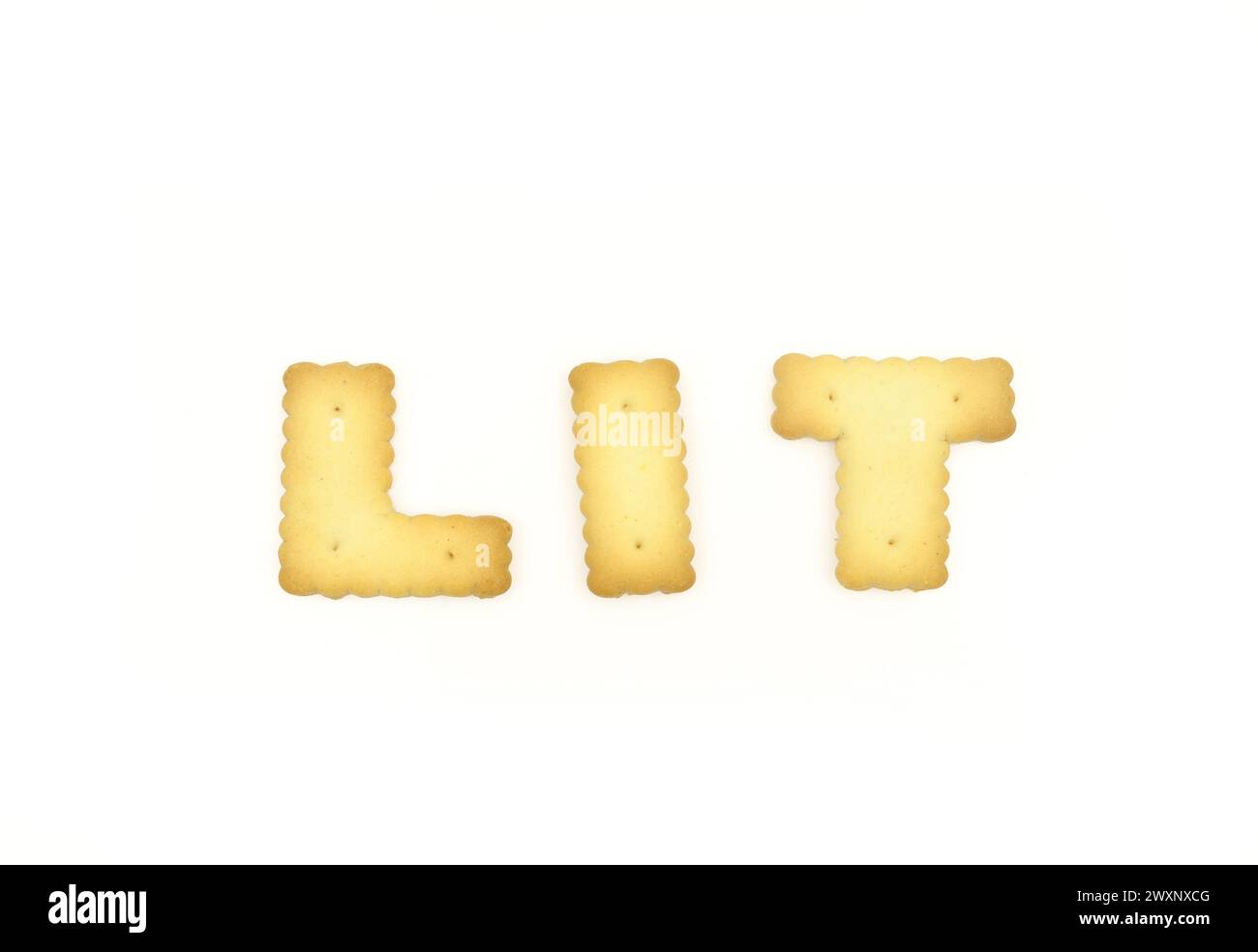 Capital letter shaped biscuits forming word lit isolated on white ...