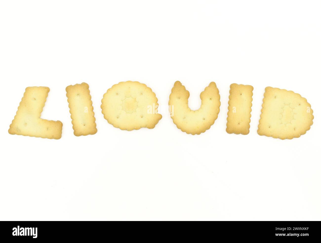 Capital letter shaped biscuits forming word LIQUID isolated on white ...