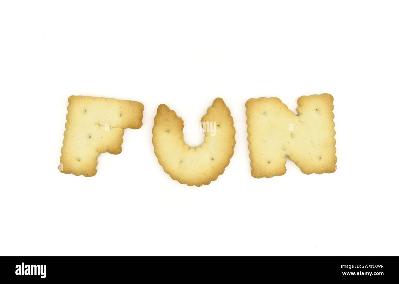 Capital letter shaped biscuits forming word FUN isolated on white ...