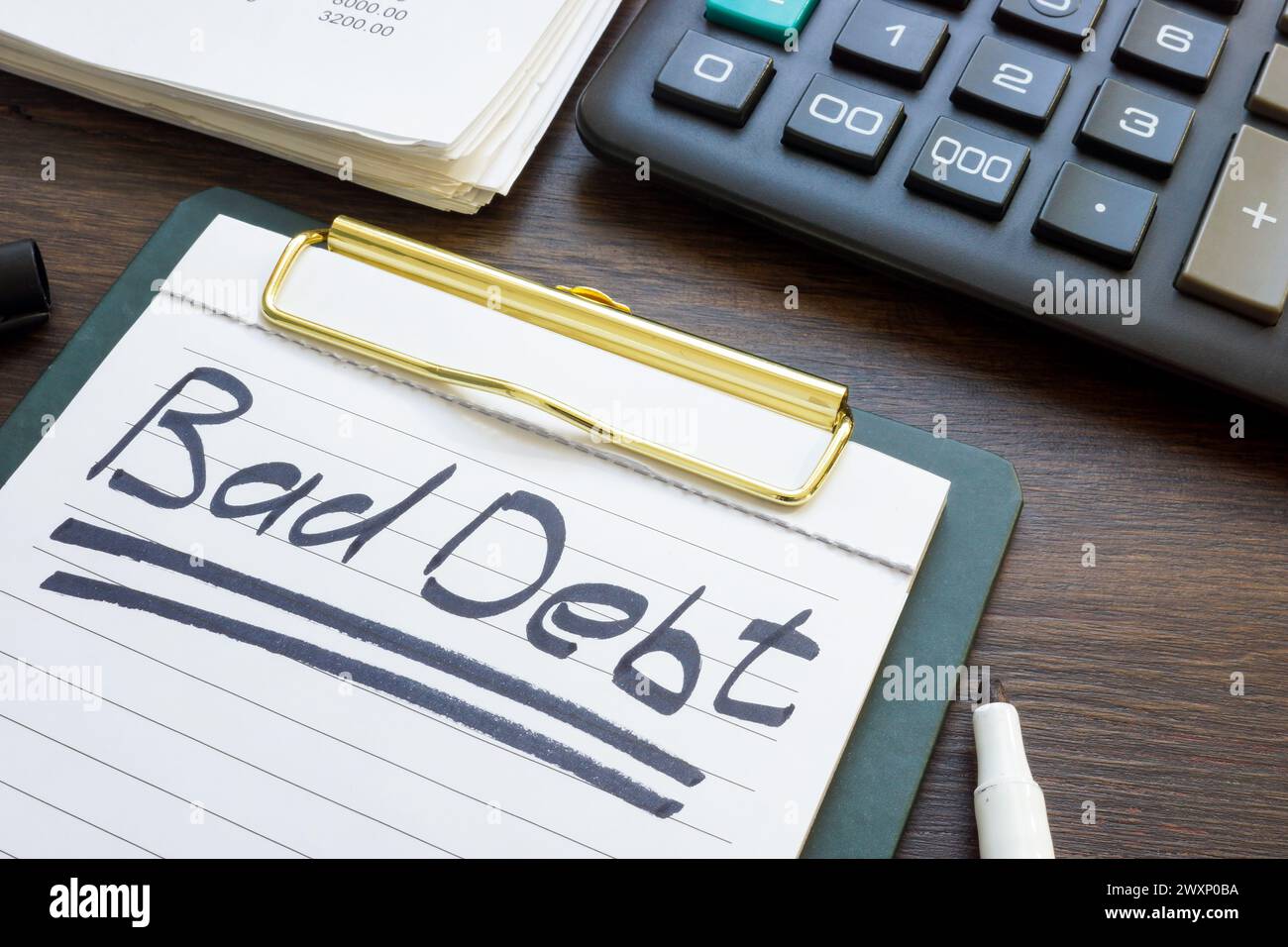 Bad debt concept. Financial report, calculator and note paper Stock ...