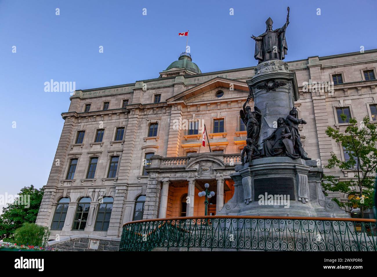 Historic post office building with the Statue of François Xavier de ...