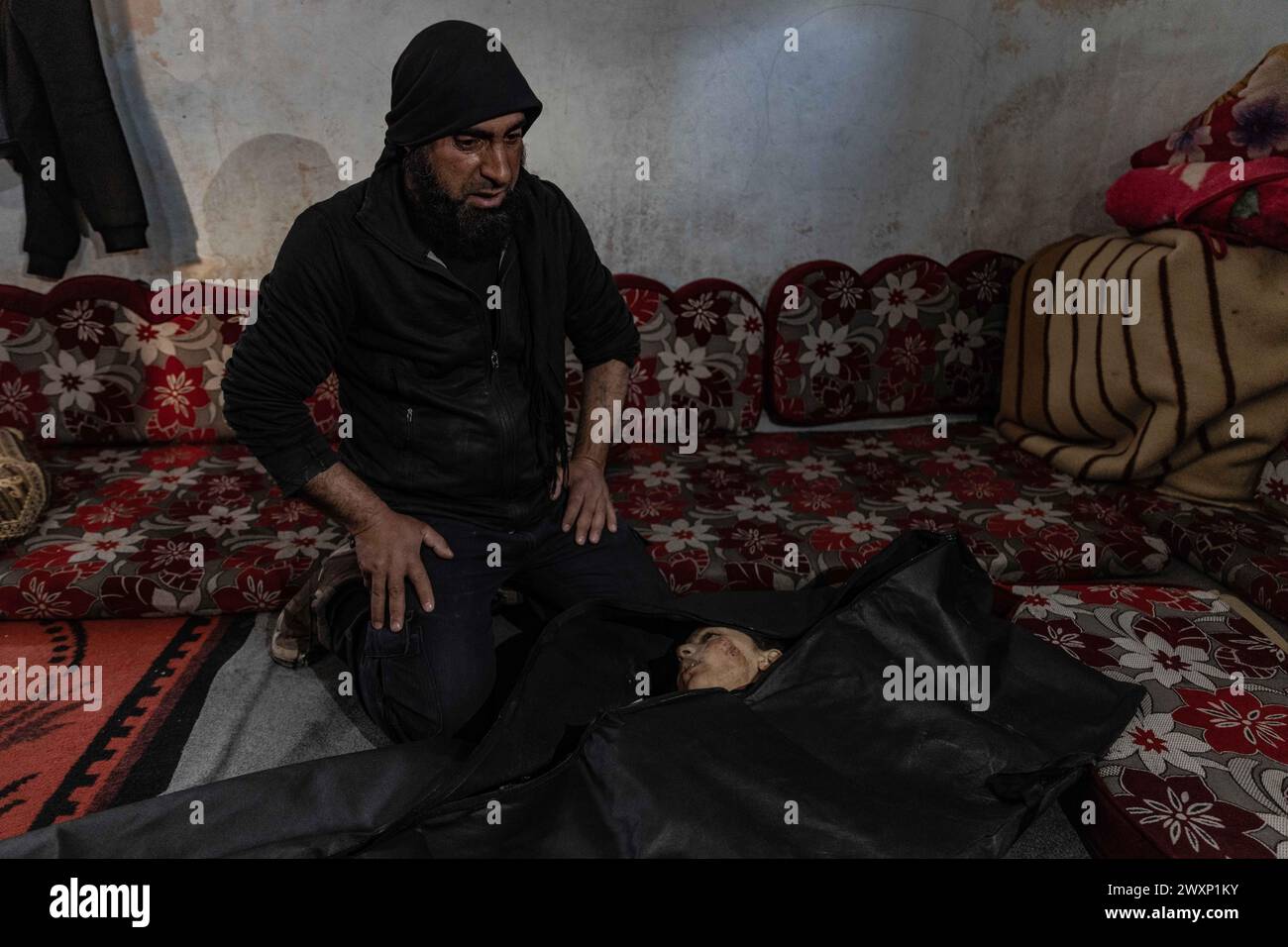 Sarmin, Syria. 01st Apr, 2024. A relative of the child, Farida Hamami ...