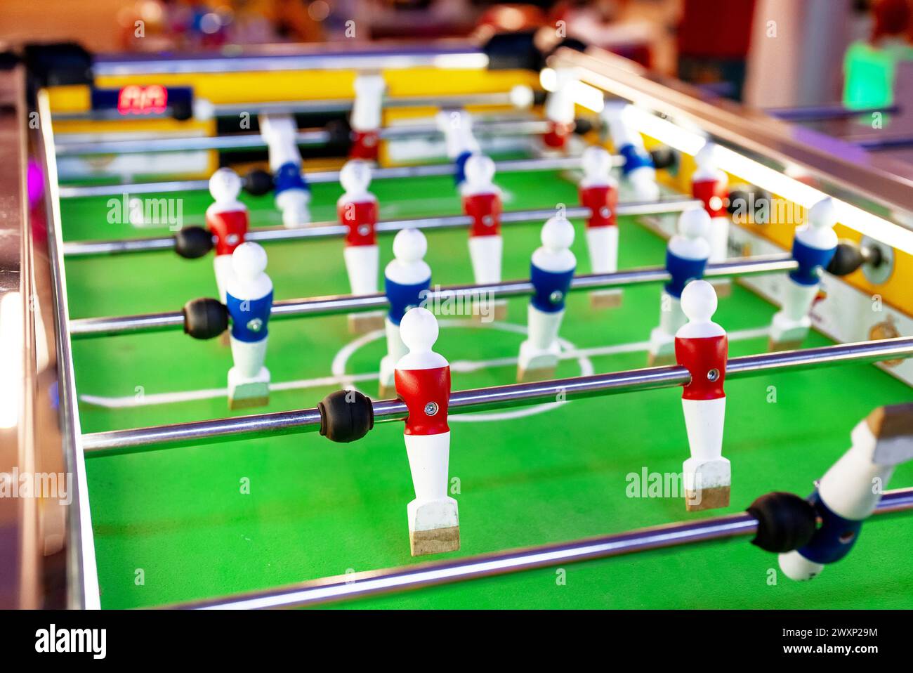 Table football game with red and blue players Stock Photo - Alamy