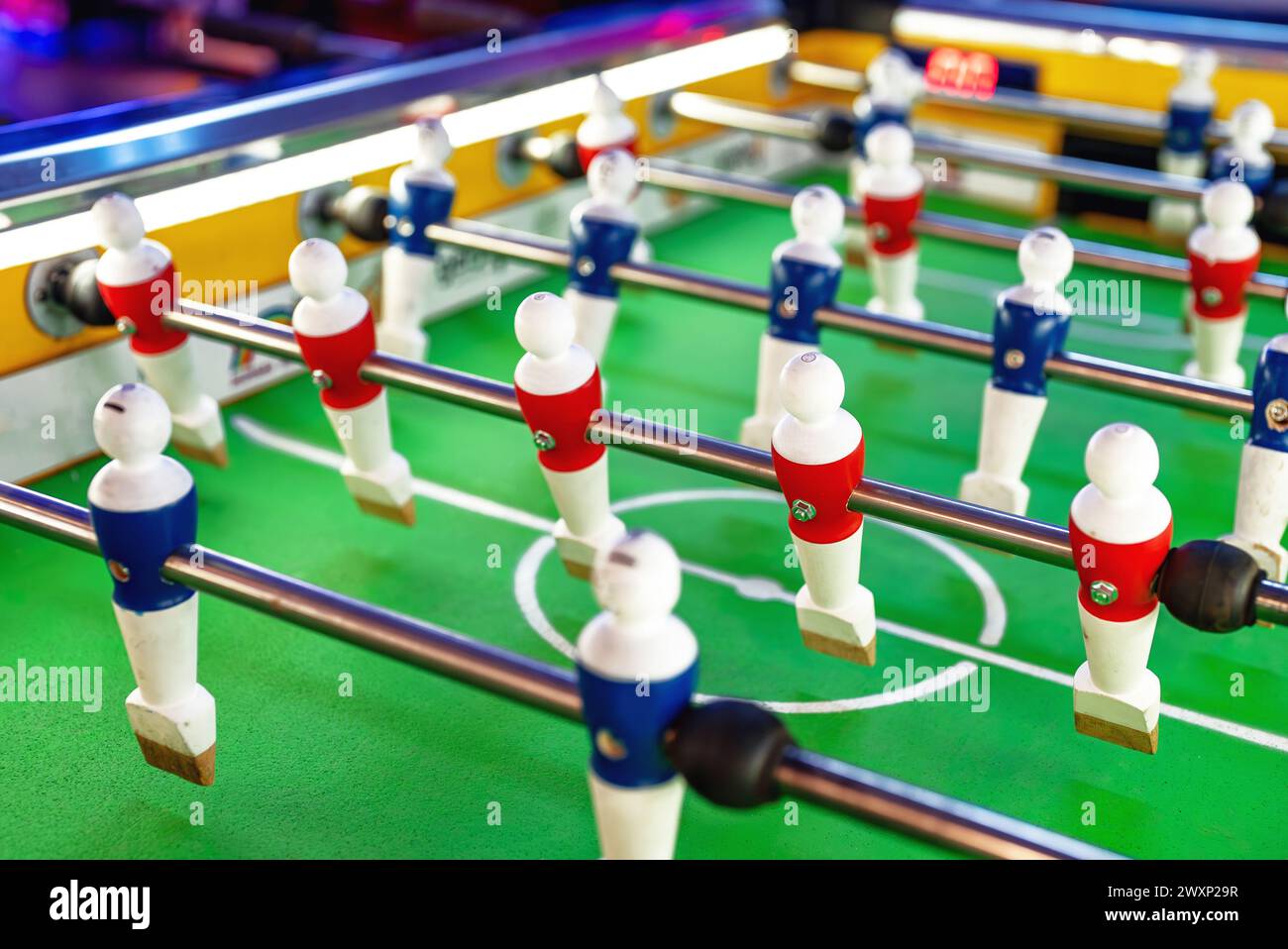 Table football game with red and blue players Stock Photo - Alamy