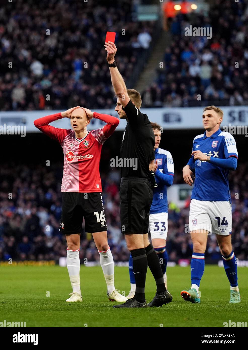 Southampton's James Bree (not pictured) is shown a red card by referee ...