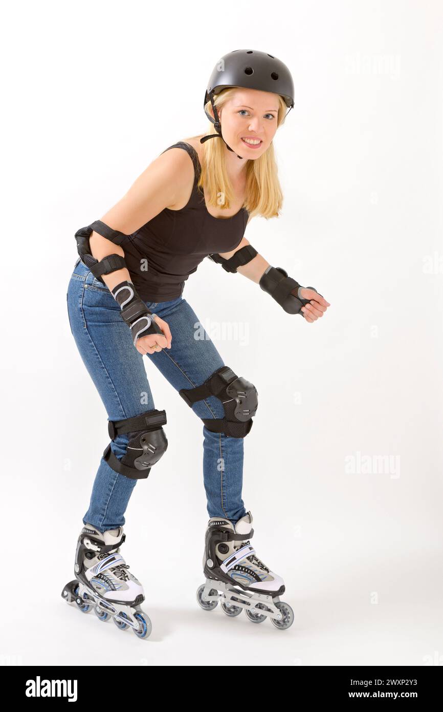 Young woman on rollerskates Stock Photo - Alamy
