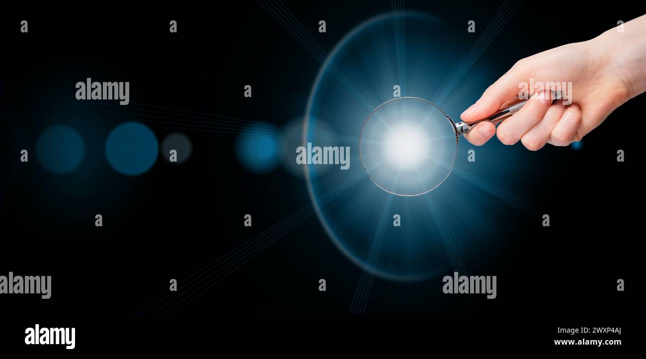 Magnifying glass in hand, light, insight. Banner background Stock Photo ...