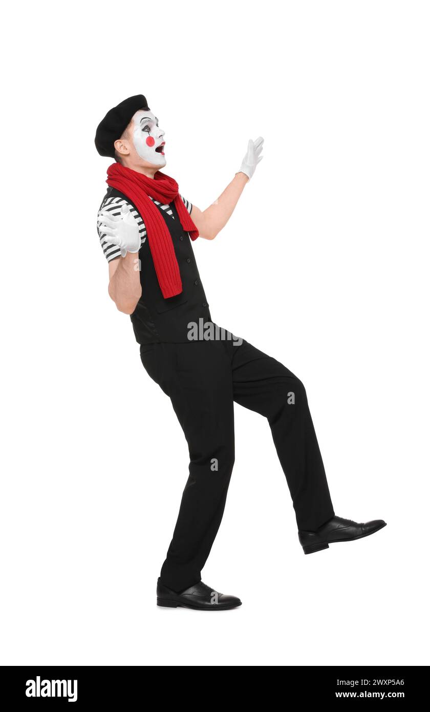 Funny mime artist making shocked face on white background Stock Photo ...