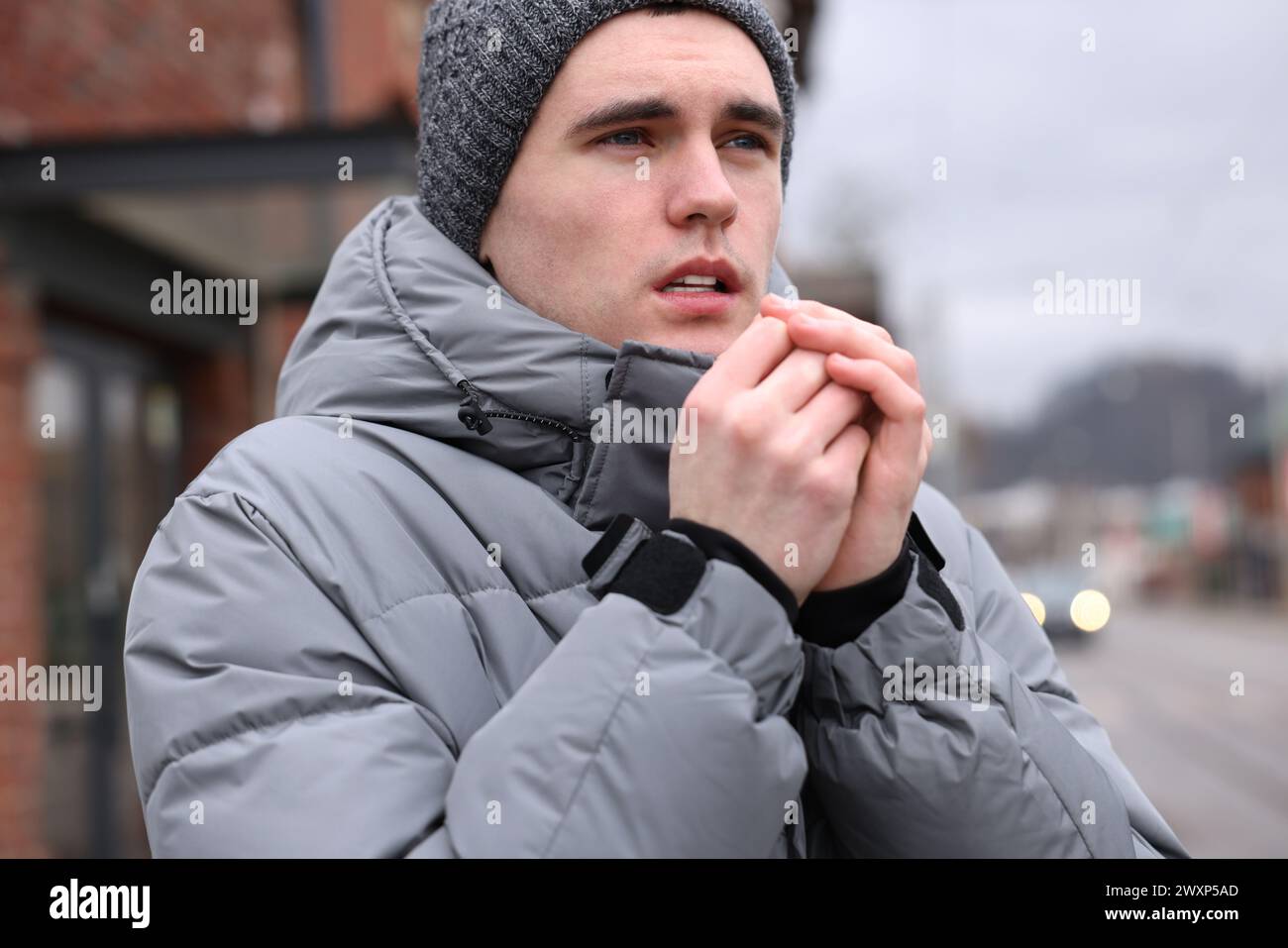 Sick man coughing on hands hi-res stock photography and images - Alamy