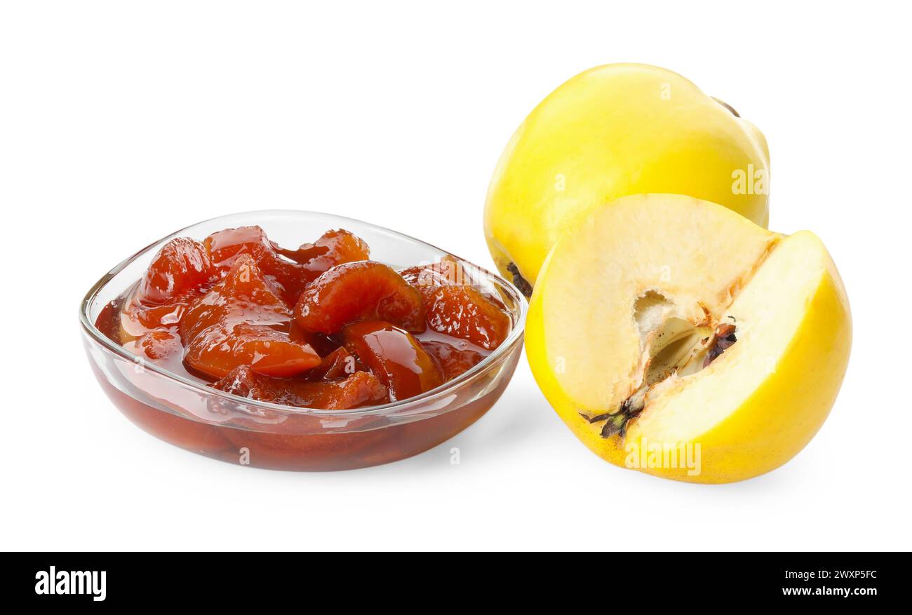 Quince jam in glass bowl and fresh raw fruits isolated on white Stock ...
