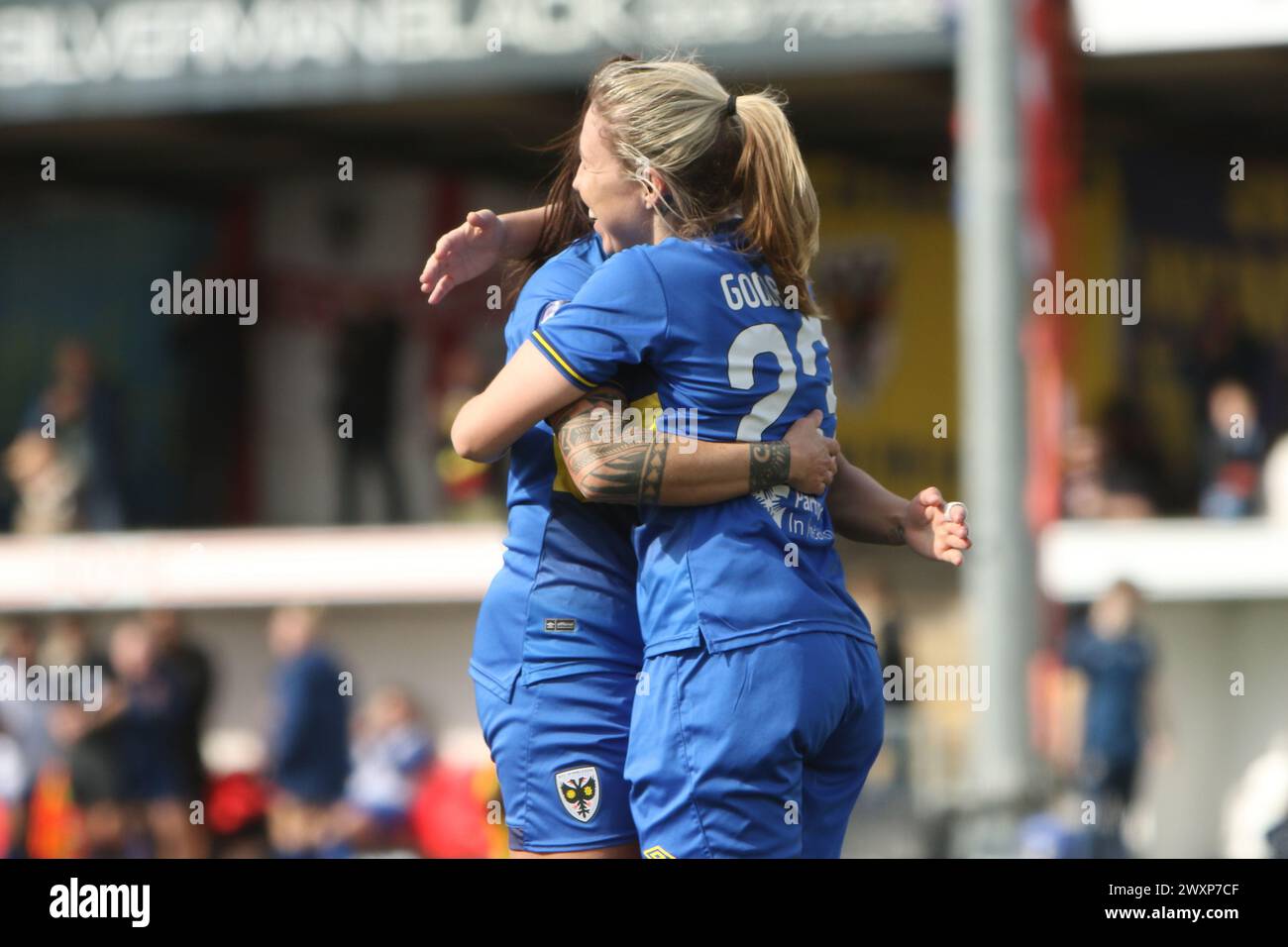Ashlee Hincks and Amy Goddard celebrate Goddard's goal AFC Wimbledon ...