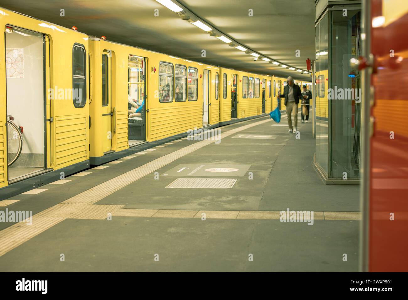 Interior of metro station of Potzdamer platz. Yellow metro train is ...