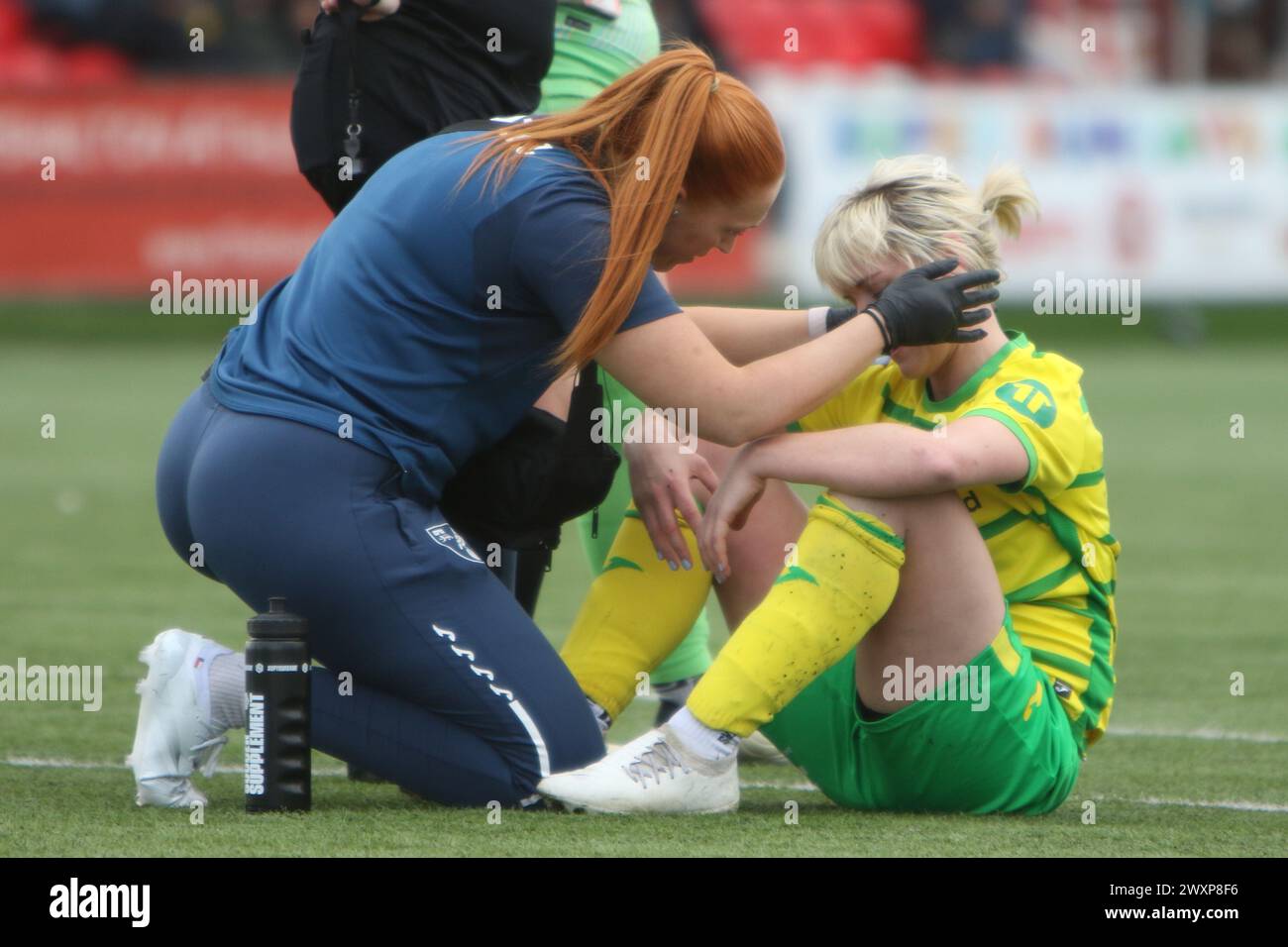 Physio assesses head injury AFC Wimbledon Women v Norwich City Women FC ...
