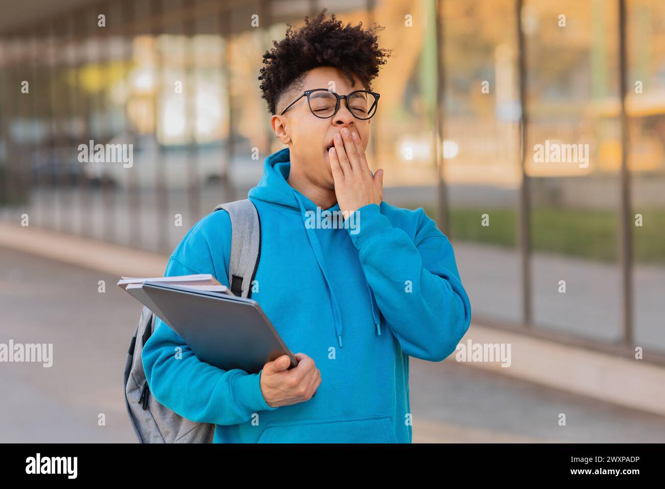 African graduate student books hi-res stock photography and images - Alamy