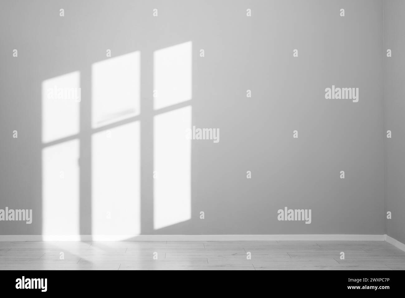 Light and shadows from window on wall indoors Stock Photo - Alamy