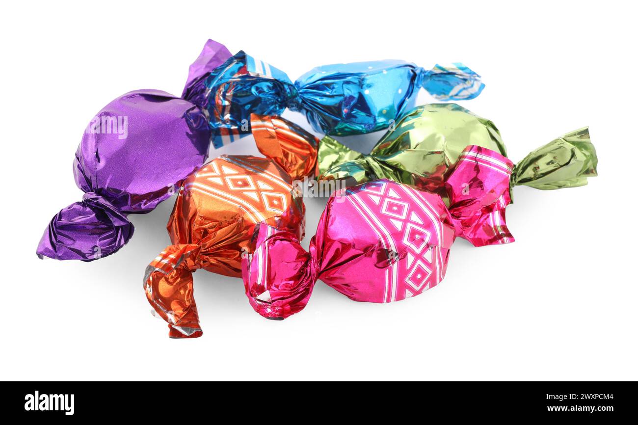 Sweet candies in colorful wrappers on white background Stock Photo - Alamy