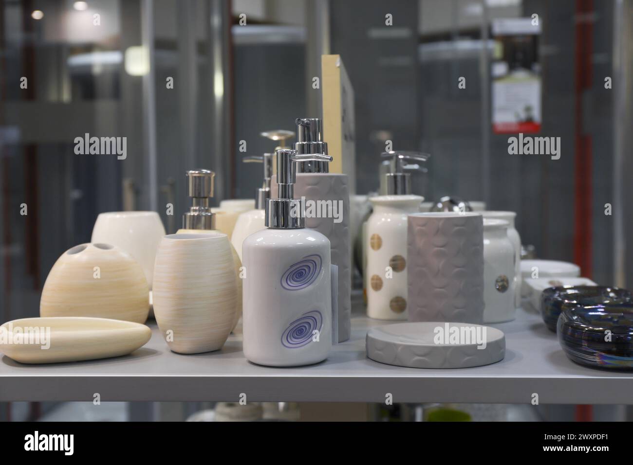 Sets of bath accessories on display in store Stock Photo - Alamy