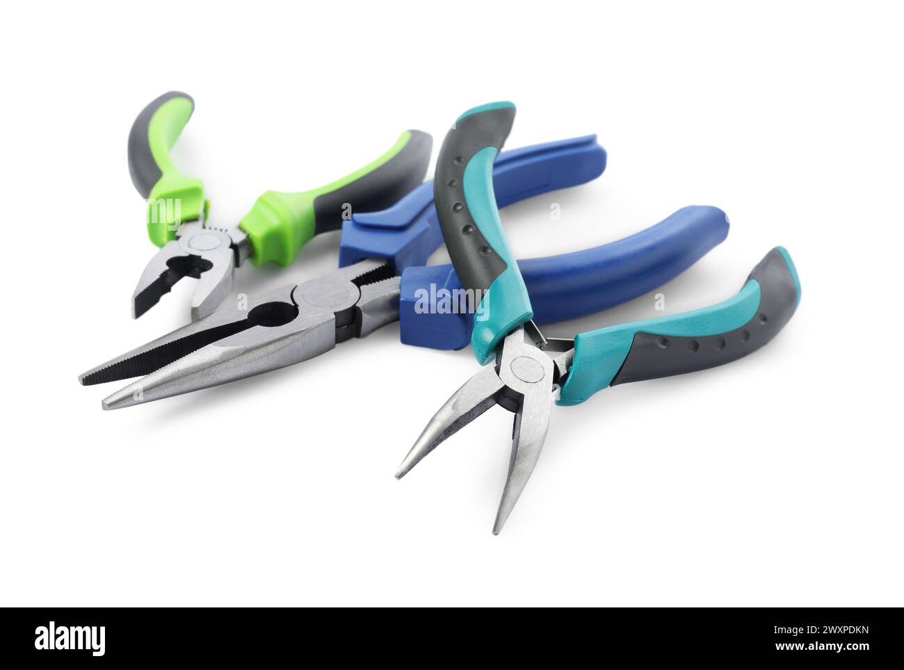 Different pliers isolated on white. Construction tool Stock Photo - Alamy