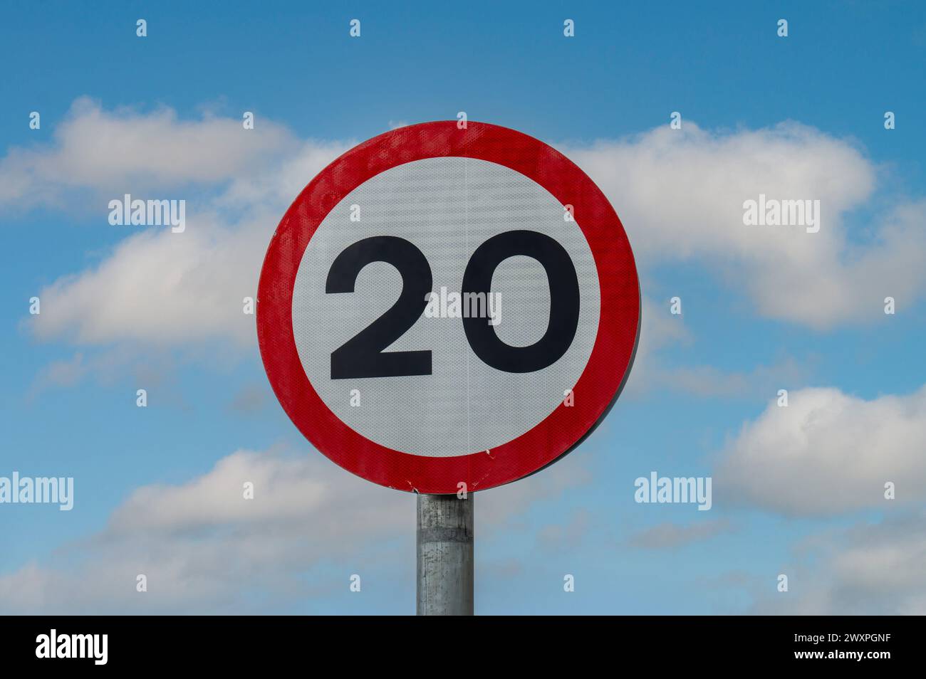 20 mph speed limit sign in town centre Stock Photo - Alamy