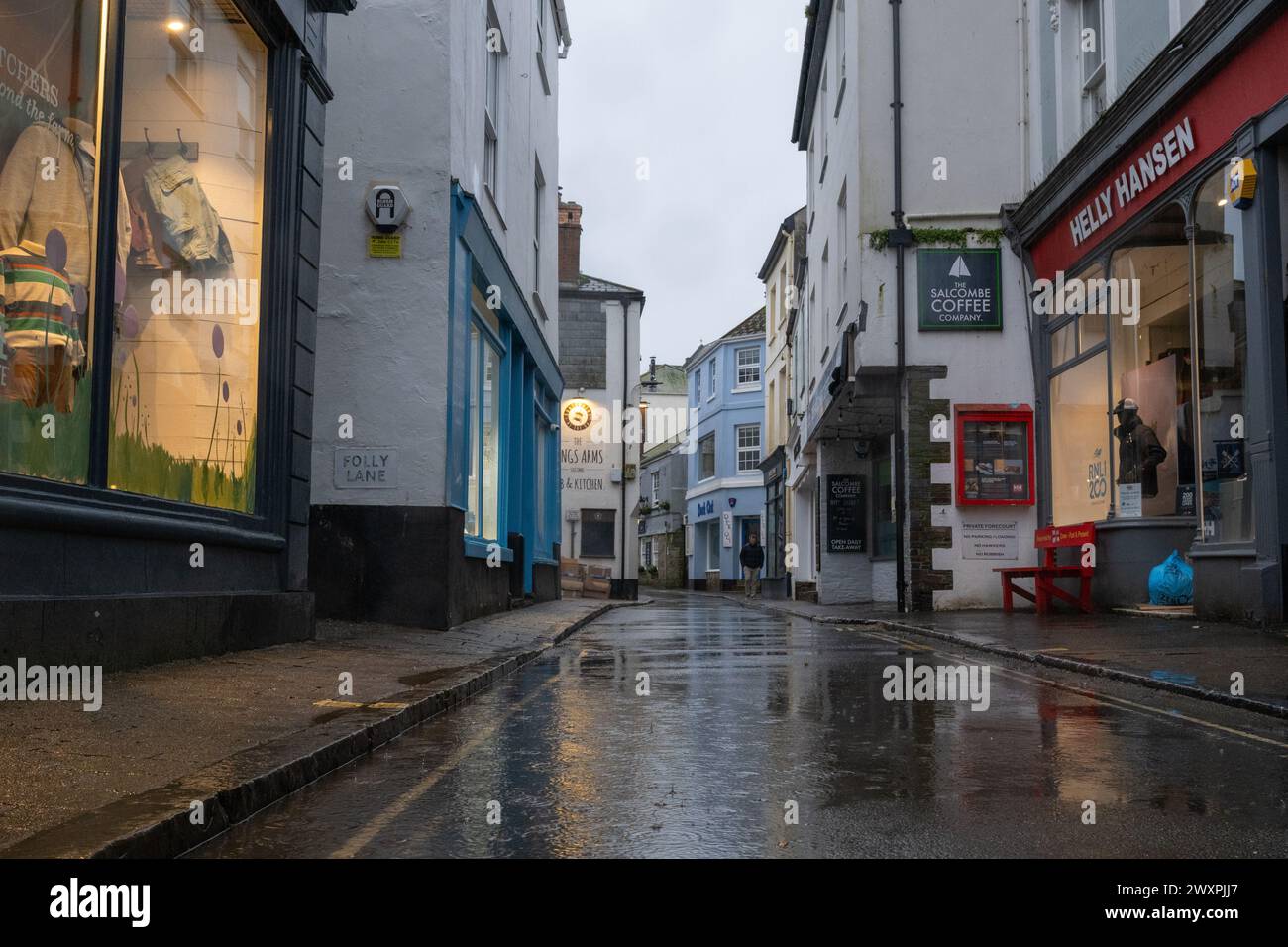 View along a virtually empty Fore Street on a rainy spring day, with ...