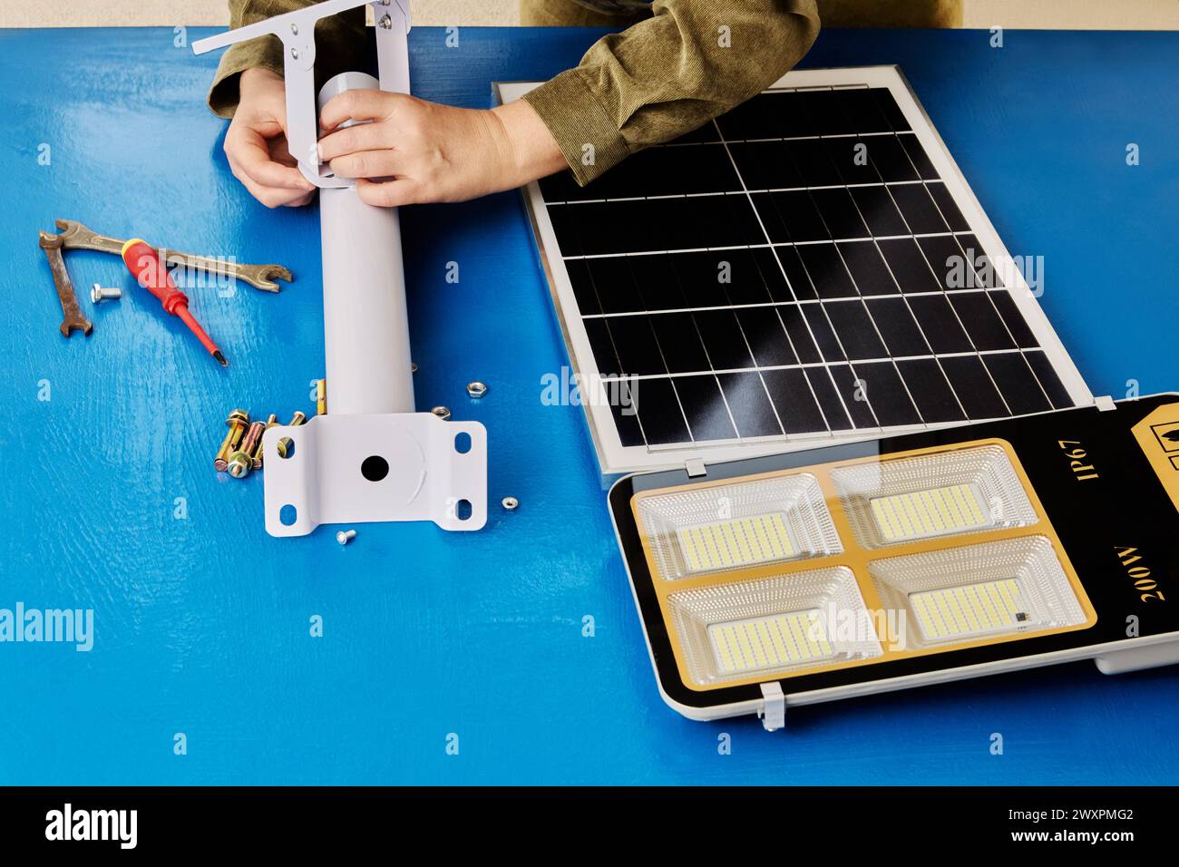 DIY assembly of mounting bracket for holder of solar panel and an LED ...