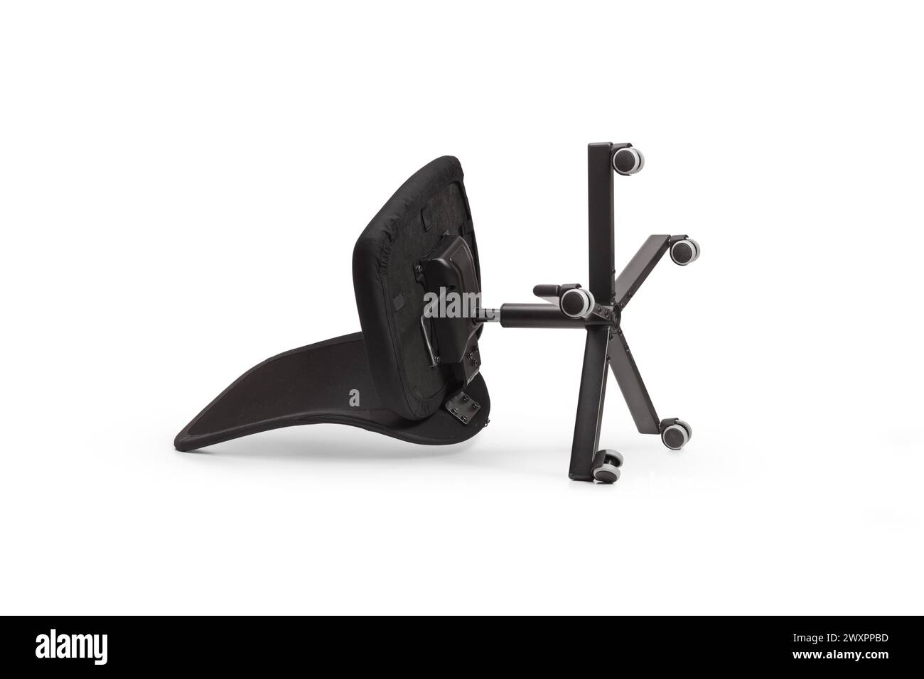 Studio shot of a black desk chair falling on the ground isolated on ...