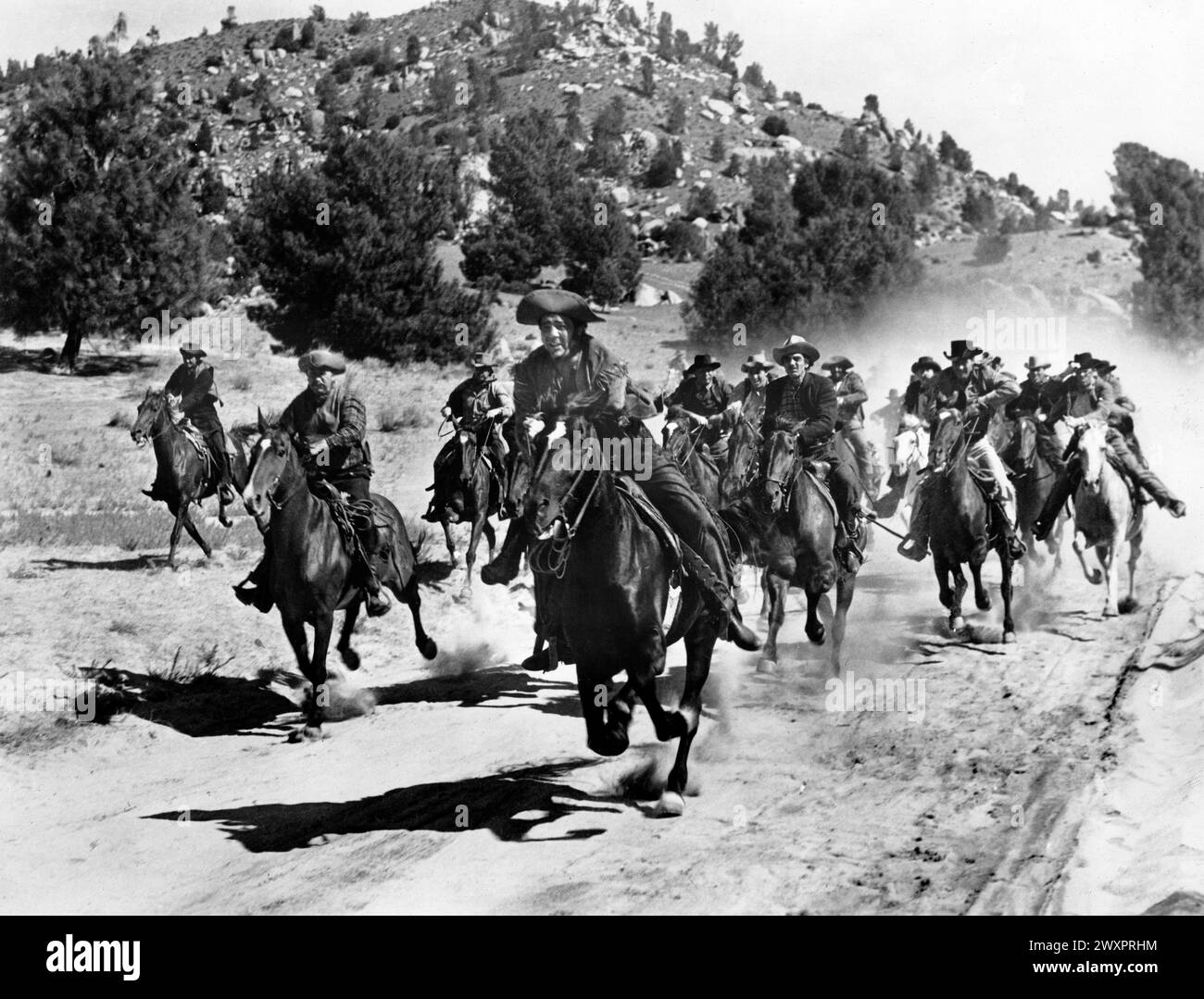 Max Baer (center), on-set of the film, "Buckskin Frontier", United ...