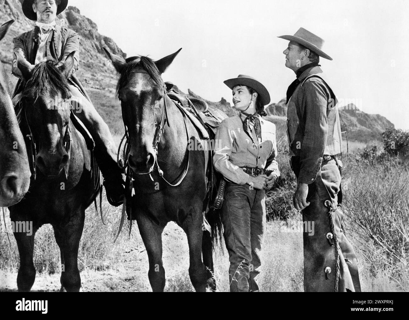 Gloria Talbott, Joel McCrea (right), on-set of the film, "Cattle Empire ...