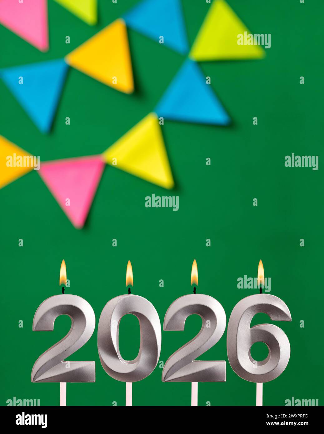 Happy New Year 2026 - Candles in the form of lit numbers Stock Photo ...