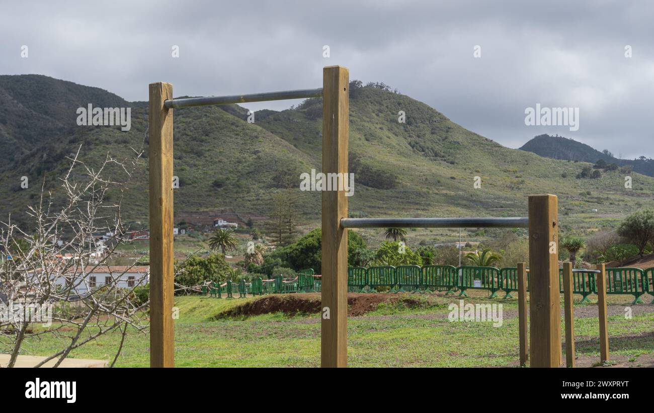 Outdoor workout, scenic green hills, tranquil village backdrop Stock ...