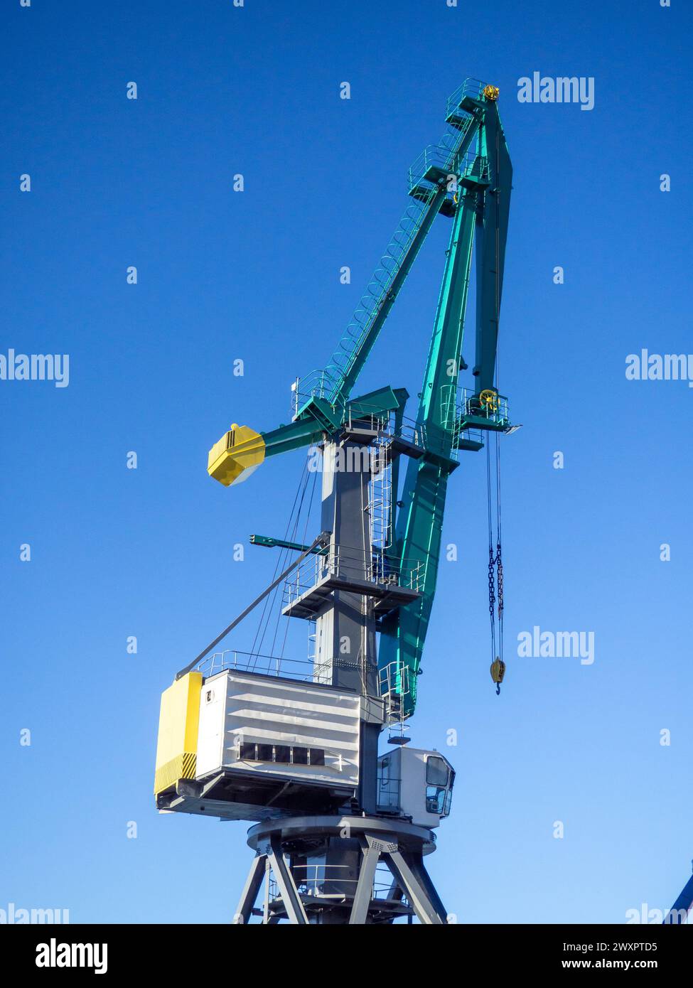 Marine cranes. Loading heavy loads. Cranes against the sky. Port ...