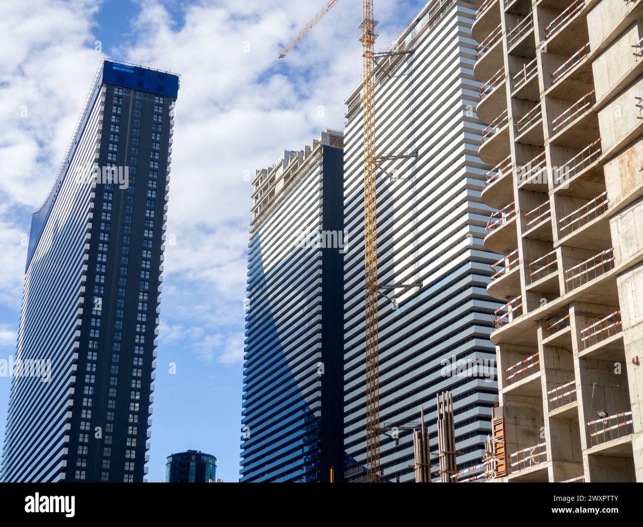 Construction of a high-rise building in Asia. Construction industry in ...