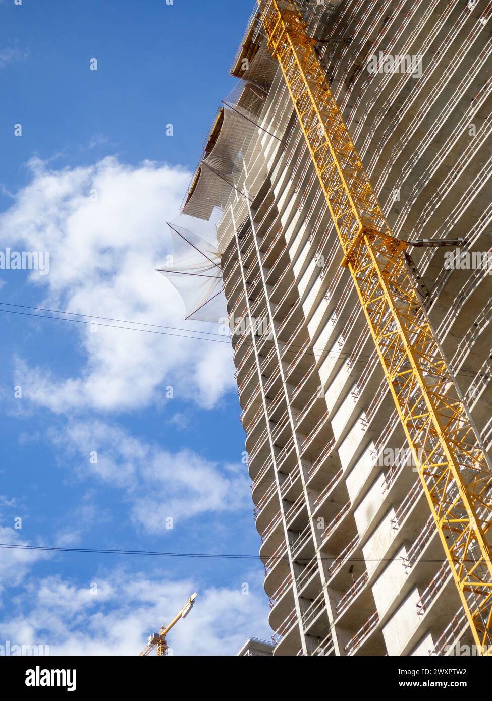 Construction of a high-rise building in Asia. Construction industry in ...